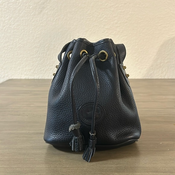 Dooney & Bourke | Bags | Dooney Bourke Small Drawstring Crossbody Navy ...